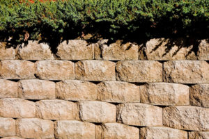 The Benefits of Segmented Walls vs. Timber Walls - Well Rooted Gardens